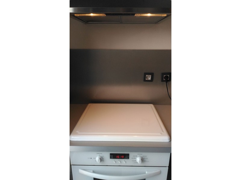 Plaque de protection pour plaque de cuisson